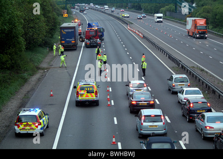 Traffic jam and speed restrictions on M25 Motorway, Surrey, England ...