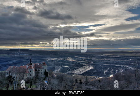 Coal opencast mine with old castle in the foreground Stock Photo - Alamy