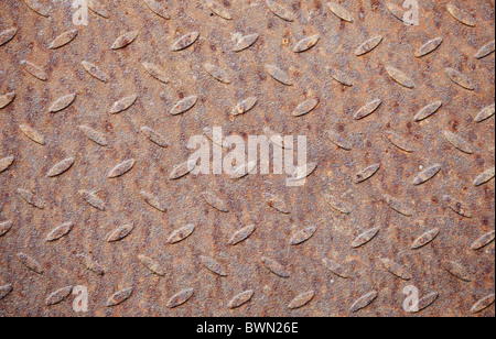 Old rusty steel deck with a simple pattern - background Stock Photo - Alamy