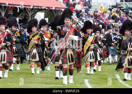 Scottish Massed Pipe Bands marching at the "Braemar Gathering ...
