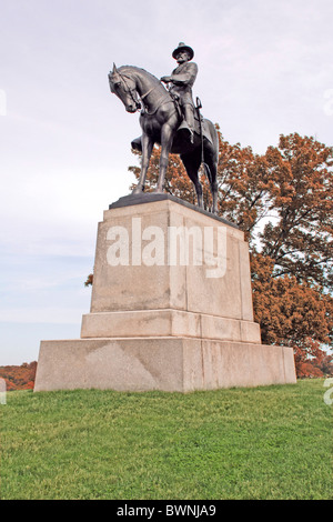 Tourists visiting Gettysburg battlefield , General Meade statue behind ...