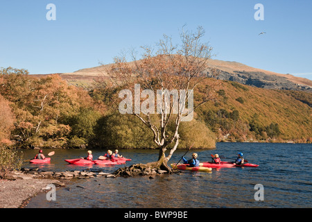 People canoeing in kayaks on Llyn Padarn Lake in Snowdonia National ...