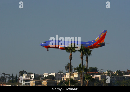 Airplane flight over a modern curved building architecture in Pekanbaru ...