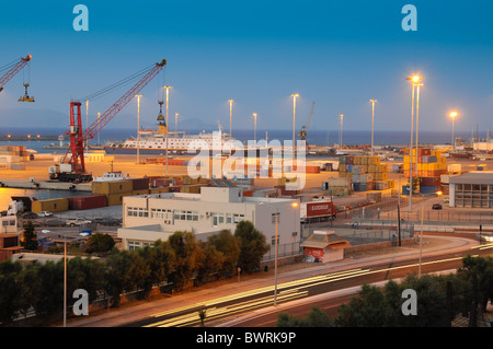 Cargo cranes in port of Heraklion, Crete, waiting for merchant ships to ...
