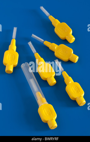 Six yellow 7mm Tepe interdental dental toothbrushes Stock Photo - Alamy