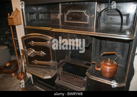Old fashioned range in fireplace of holiday cottage, Wales, UK Stock ...