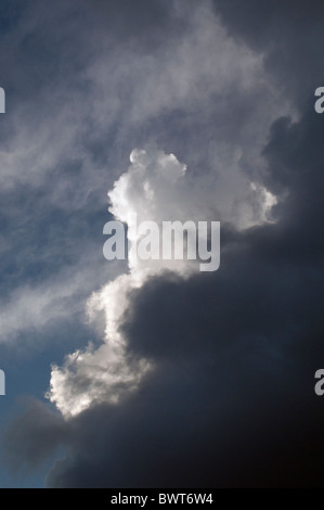 Cumulus clouds with some rain threatening clouds Stock Photo - Alamy