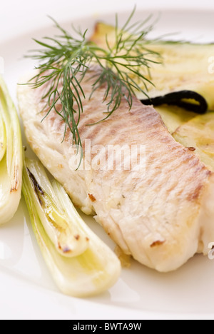 Coalfish fillet on zucchini, green asparagus and tomato, low carb Stock ...