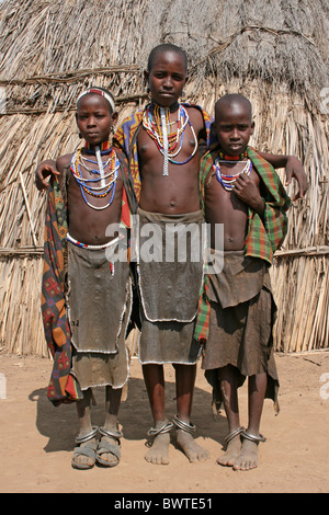 Group Of Arbore Tribe Girls Standing Beside Village Hut, Omo Valley ...