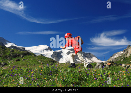 Swiss Alps boy Swiss clothing run running fun enjoying leisure ...