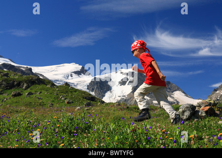 Swiss Alps boy Swiss clothing run running fun enjoying leisure ...