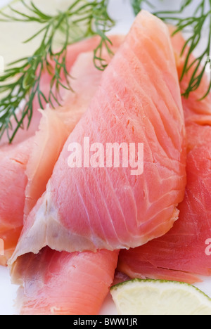 Salted salmon with lime and dill Stock Photo - Alamy
