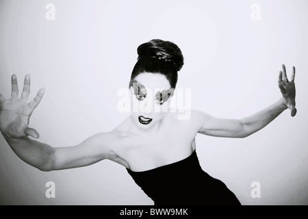 Portrait, extreme and aggressive, using angles. Extreme makeup and facial expressions. Fresh ...