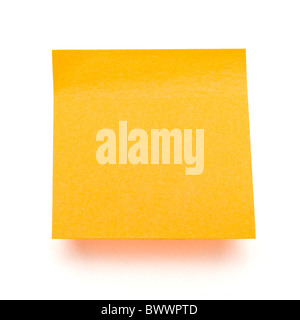 Orange self adhesive post it note with green push pin on white Stock ...
