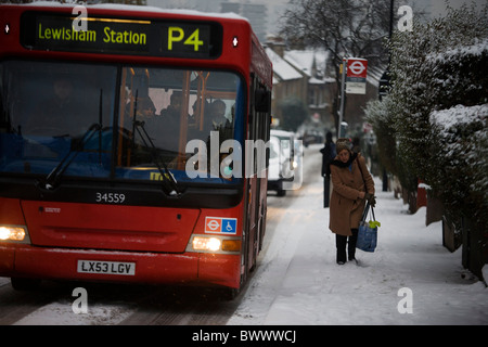 A P4 bus service climbs Herne Hill early after fresh overnight snowfall ...