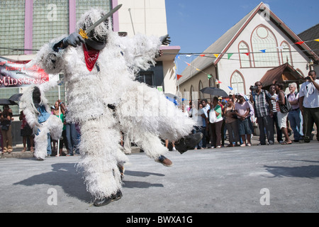 Trinidad Junior Traditional Mas parade - moko jumbie band Stock Photo ...