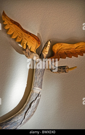 Carved wooden statue of angel Stock Photo - Alamy