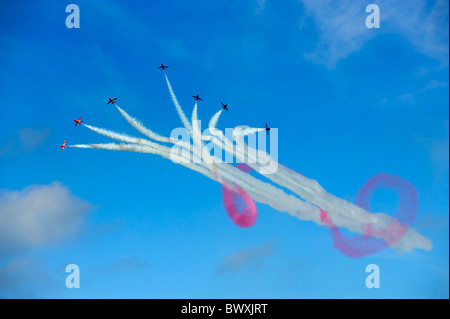 Dramatic Red Arrows formation break during an airshow display Stock ...