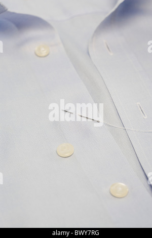 Dress Shirt with Missing Button Stock Photo - Alamy