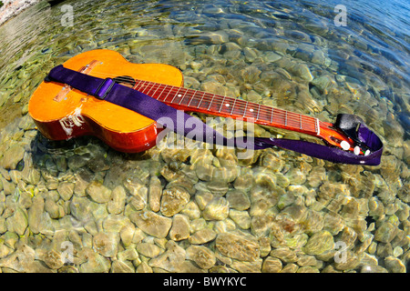 Guitar Floating in Sea, Horgota Beach, Kefalonia Greece Stock Photo - Alamy