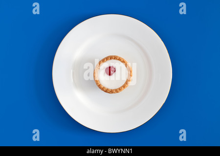 Solitary bakewell bun on a white plate plus clipping path Stock Photo ...