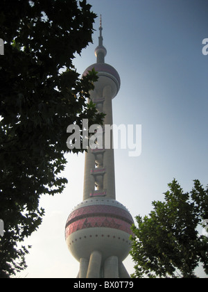 The Oriental Pearl Radio & TV Tower and Shanghai Tower stand among the ...