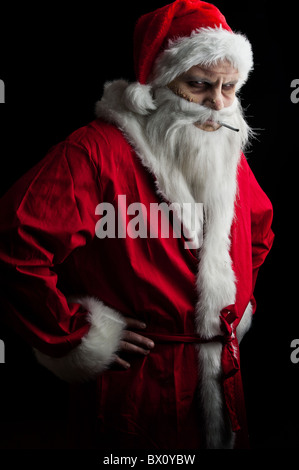 portrait of a scary looking santa claus Stock Photo - Alamy