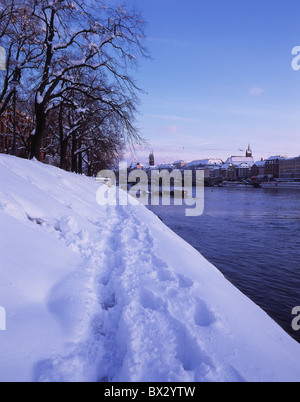 Basel Basle town city winter promenade Rhine shore river Rhine snow ...