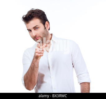 Man in white shirt pointing both fingers forward Stock Photo - Alamy