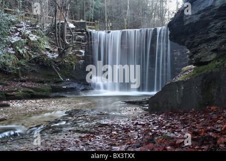 Bersham waterfall and River Clywedog with snow and autumn leaves near ...
