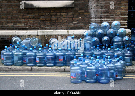 Empty Water Cooler Bottles Stock Photo - Alamy