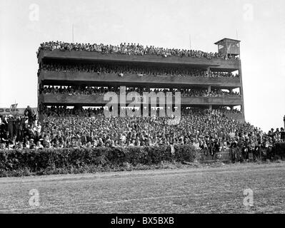 Czechoslovakia," Velka Pardubicka" steeplechase. Jockey nogotiates ...
