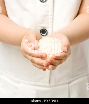 handful of rice Stock Photo - Alamy