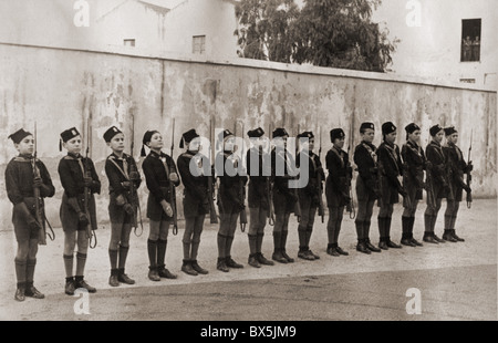 Members of Balilla, an Italian fascist youth movement, parade proudly ...