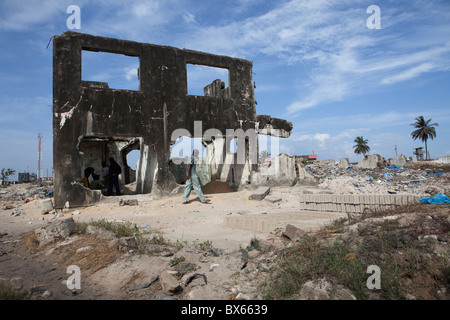 City scene along oceanfront showing war damaged buildings. | Monrovia ...