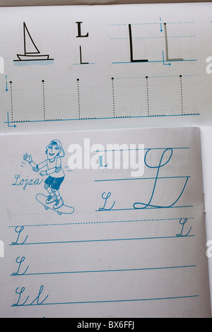 Comenia Script universal, alphabet Stock Photo - Alamy