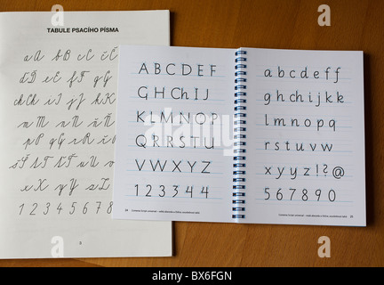 Comenia Script universal, alphabet Stock Photo - Alamy