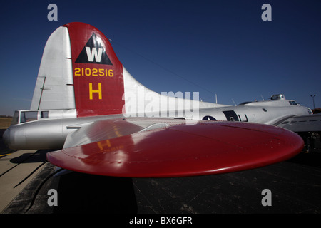 Aluminum Overcast restored B-17 Flying Fortress WWII era bomber flight nose art woman blond ...