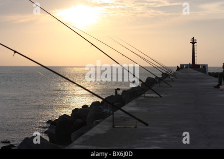 People fishing at the entrance to AnPing Harbor Tainan, Taiwan Stock ...