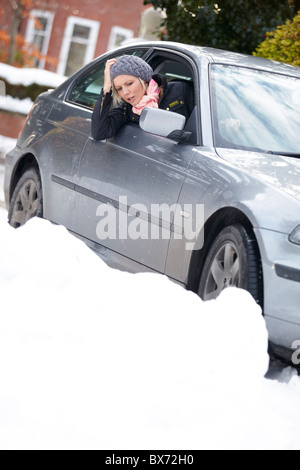 Woman stuck in snow Stock Photo - Alamy