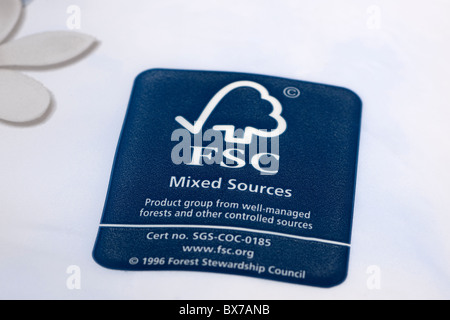 Close up of Forest Stewardship Council FSC logo stamp in plywood sheets ...