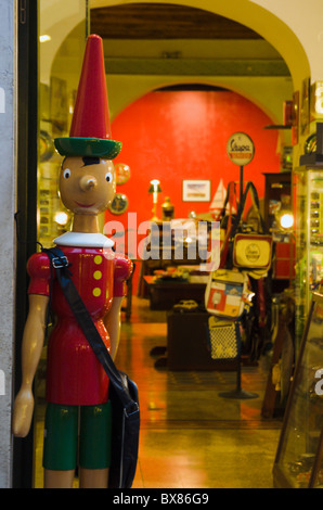 pinocchio wooden figure hanging outside a shop in Rome during Christmas ...