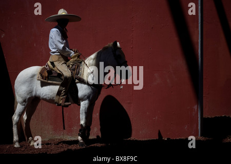 A Mexican charro ride his horse at the National Charro Championship in ...
