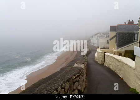 Fog at beach in Porthleven, Cornwall, UK Stock Photo - Alamy