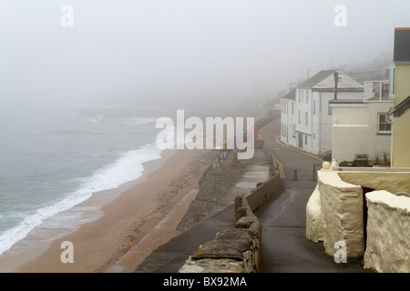 Fog at beach in Porthleven, Cornwall, UK Stock Photo - Alamy