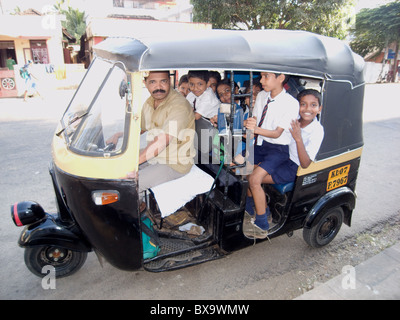 School children in auto-rickshaw, Pondicherry, Tamil Nadu, India Stock ...