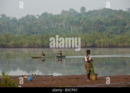 The Sierra Leone River runs through the town of Port Loko, Sierra Leone ...