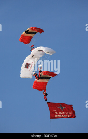 The Red Devils parachute display team with a giant union jack flag ...