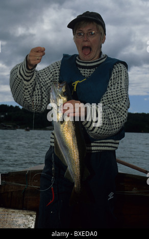 Women fishing from boat, fish, cod, mackerel, Women with fish from the ...