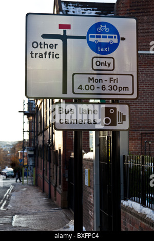 Road sign showing Bus Lane and authorized Vehicles.Mon-Fri 7-10 am. 4. ...